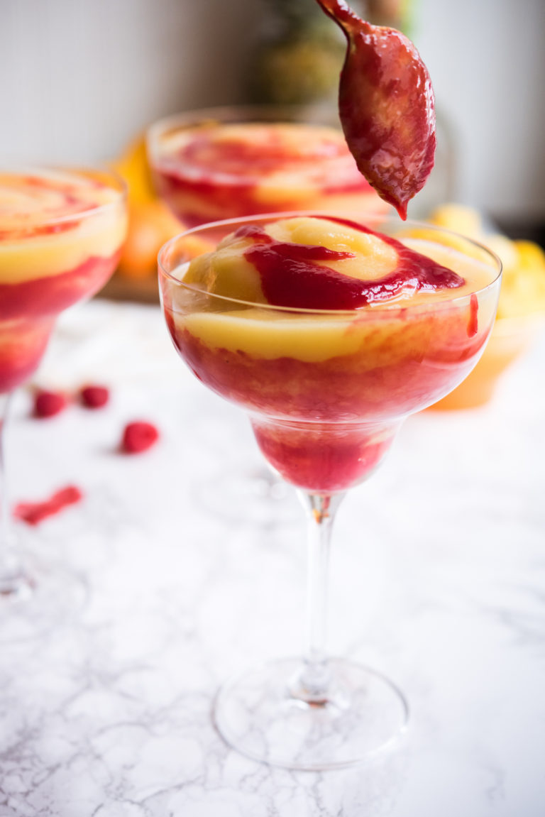 Raspberry Swirl Pineapple Mango Margaritas - The Sweetest Occasion