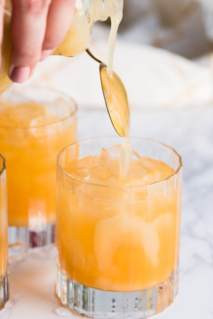 Say Sayonara Summer with a Mango Sunrise Piña Colada - The Sweetest ...